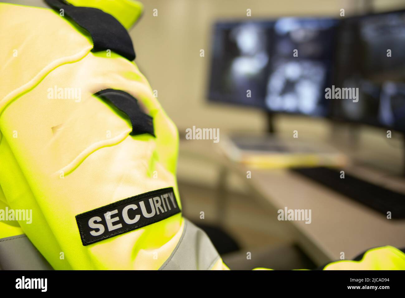 Security team watching over CCTV surveillance monitors Stock Photo - Alamy