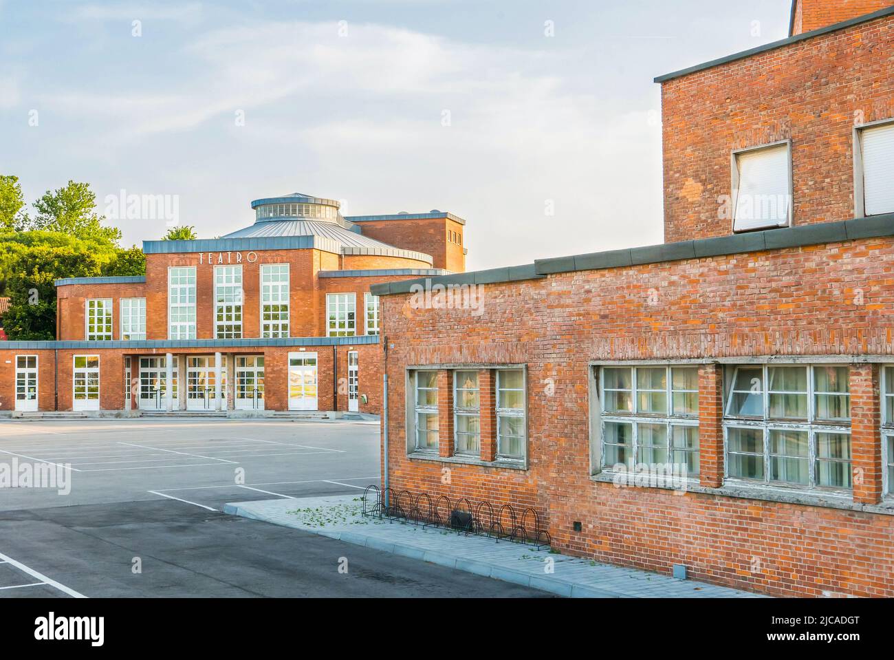 Torviscosa, Italy - The buildings of the theatre (left) and the ...