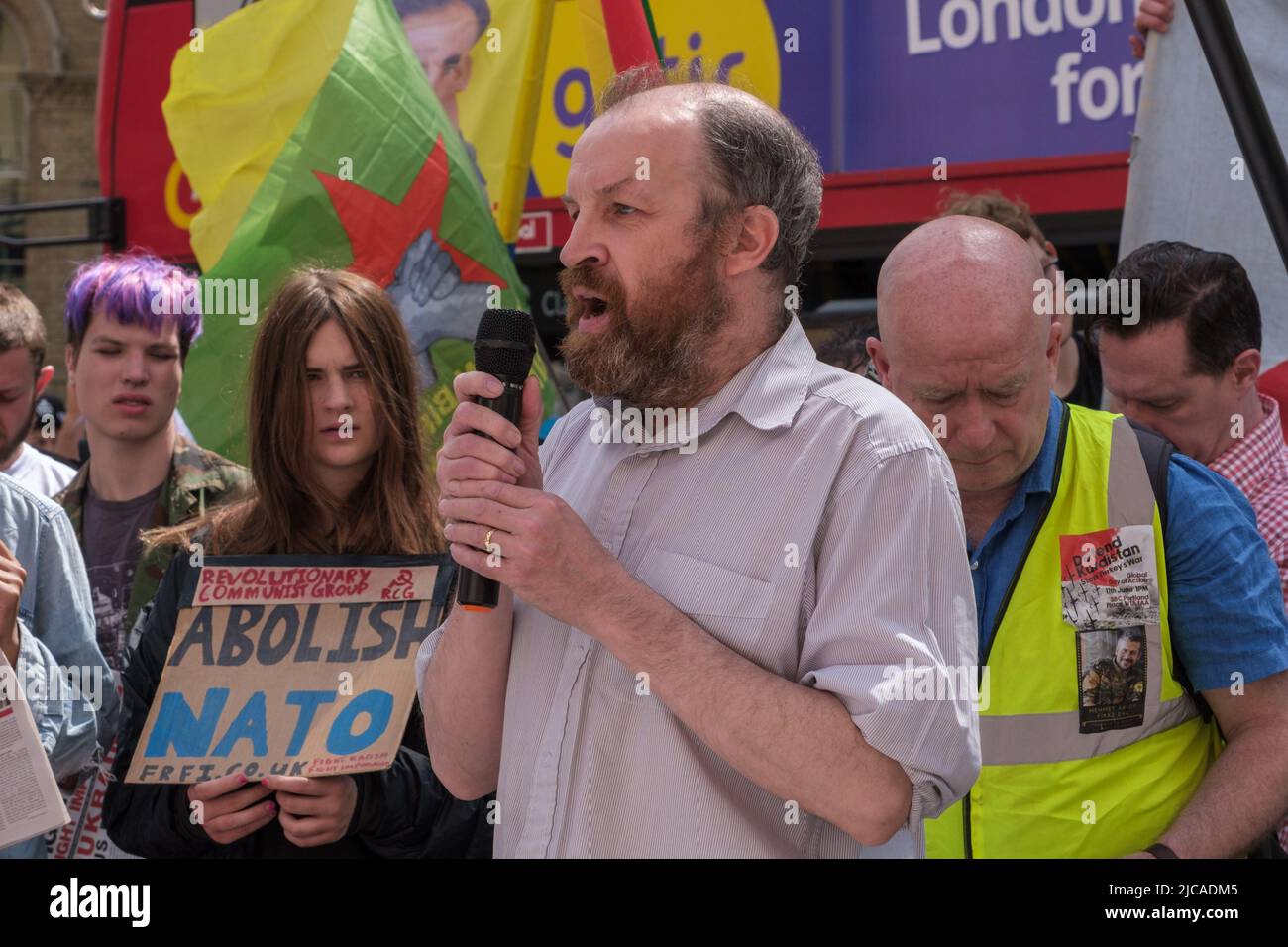 London, UK. 11 June 2022. Derek Wall speaks before campaigners march ...