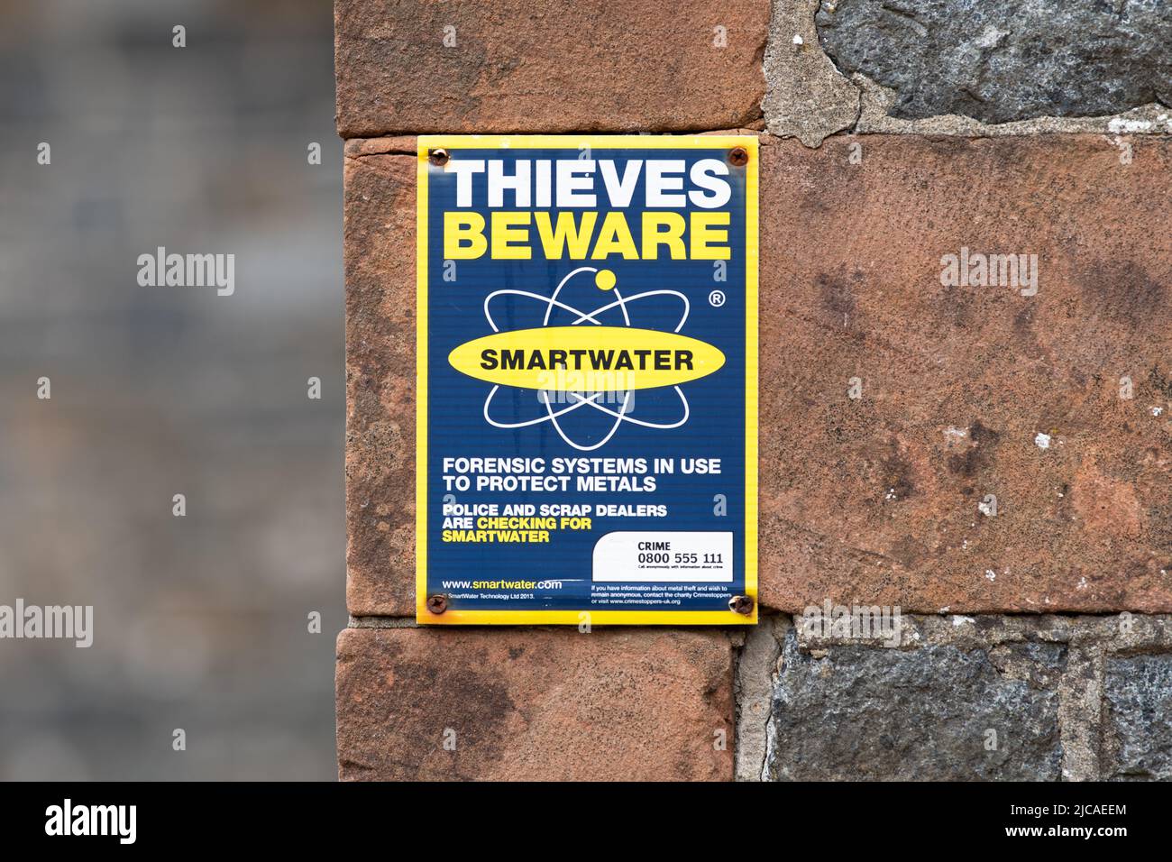 Smartwater Thieves Beware sign Stock Photo - Alamy