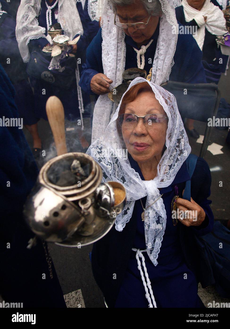 Female incense burners following the procession. Every October for the ...