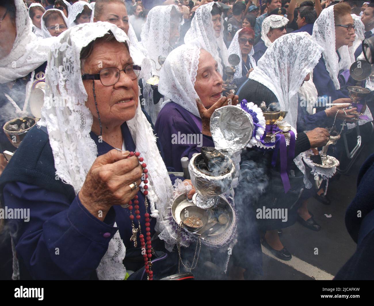 Female incense burners following the procession. Every October for the ...