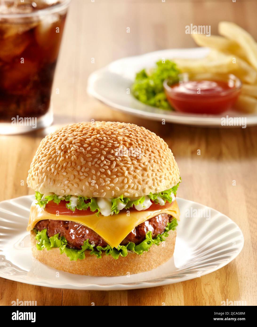 Beef and cheese burger package served with french fries in chili sauce ...