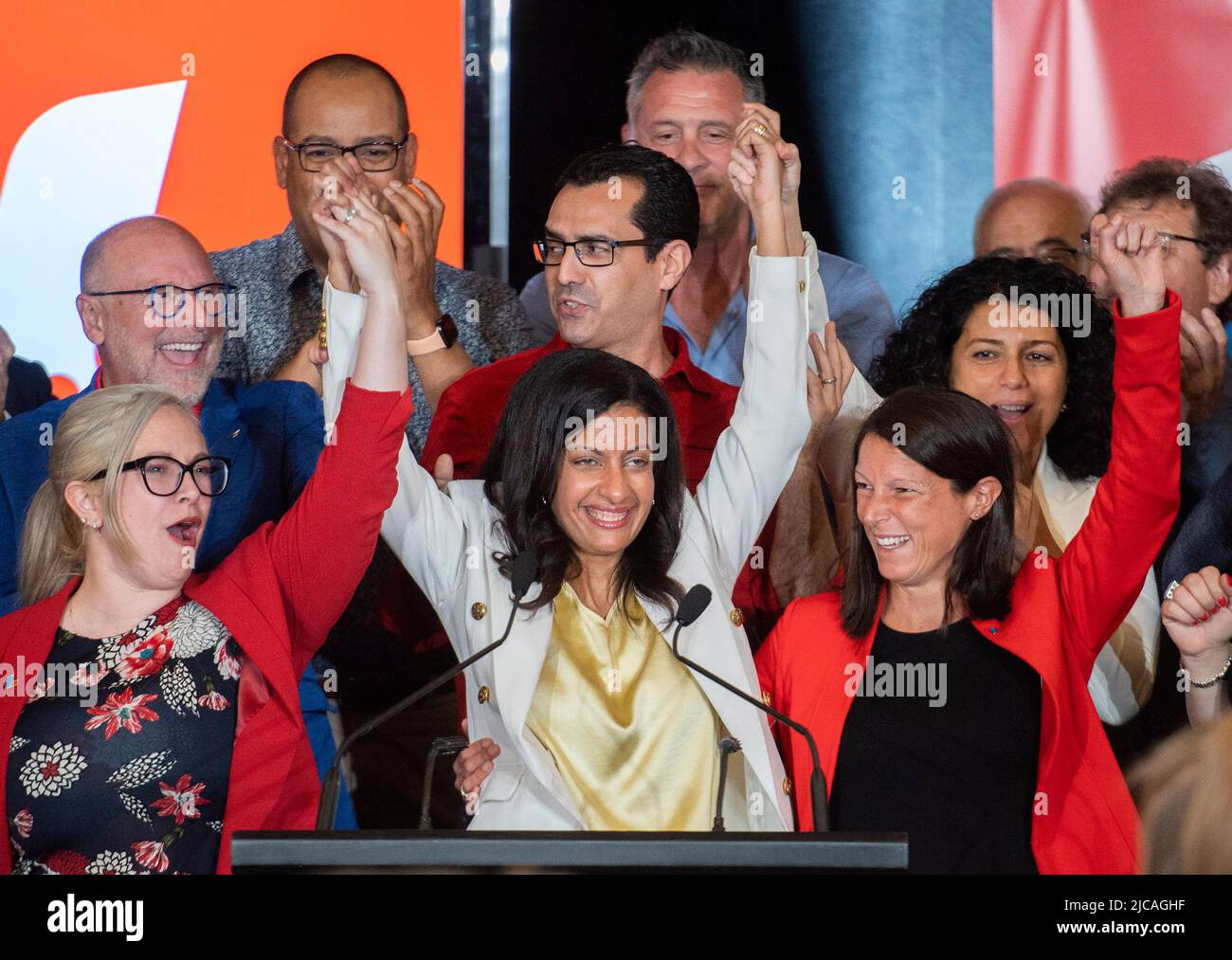 Quebec Liberal Party Leader Dominique Anglade, centre, has her arms ...