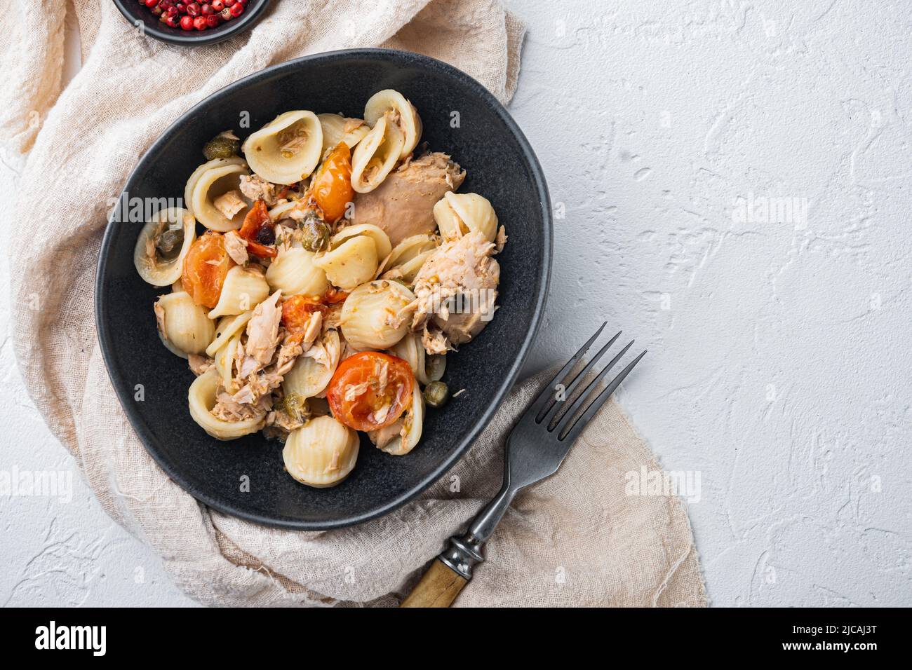 Carlofortina pasta with tuna , on white background, flat lay with copy ...