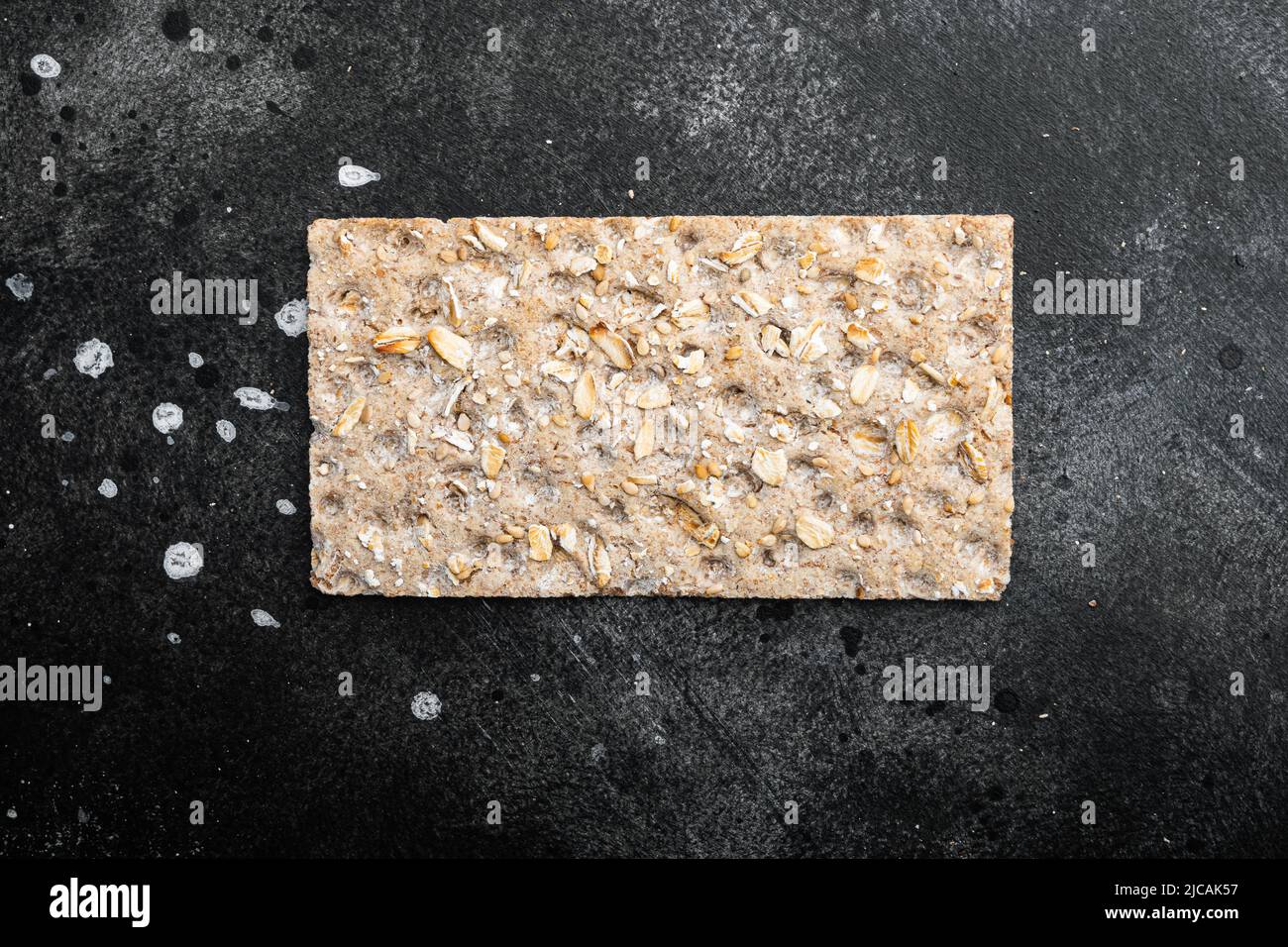 Crunchy crispbread Healthy snack, on black dark stone table background ...