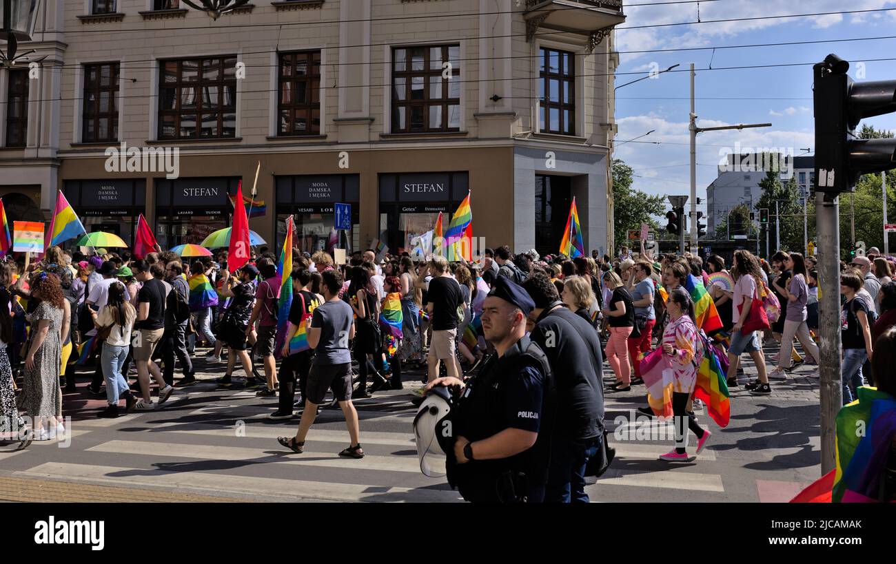 WROCLAW, POLAND - JUNE11, 2022: A crowd of people with lgbt flags on ...