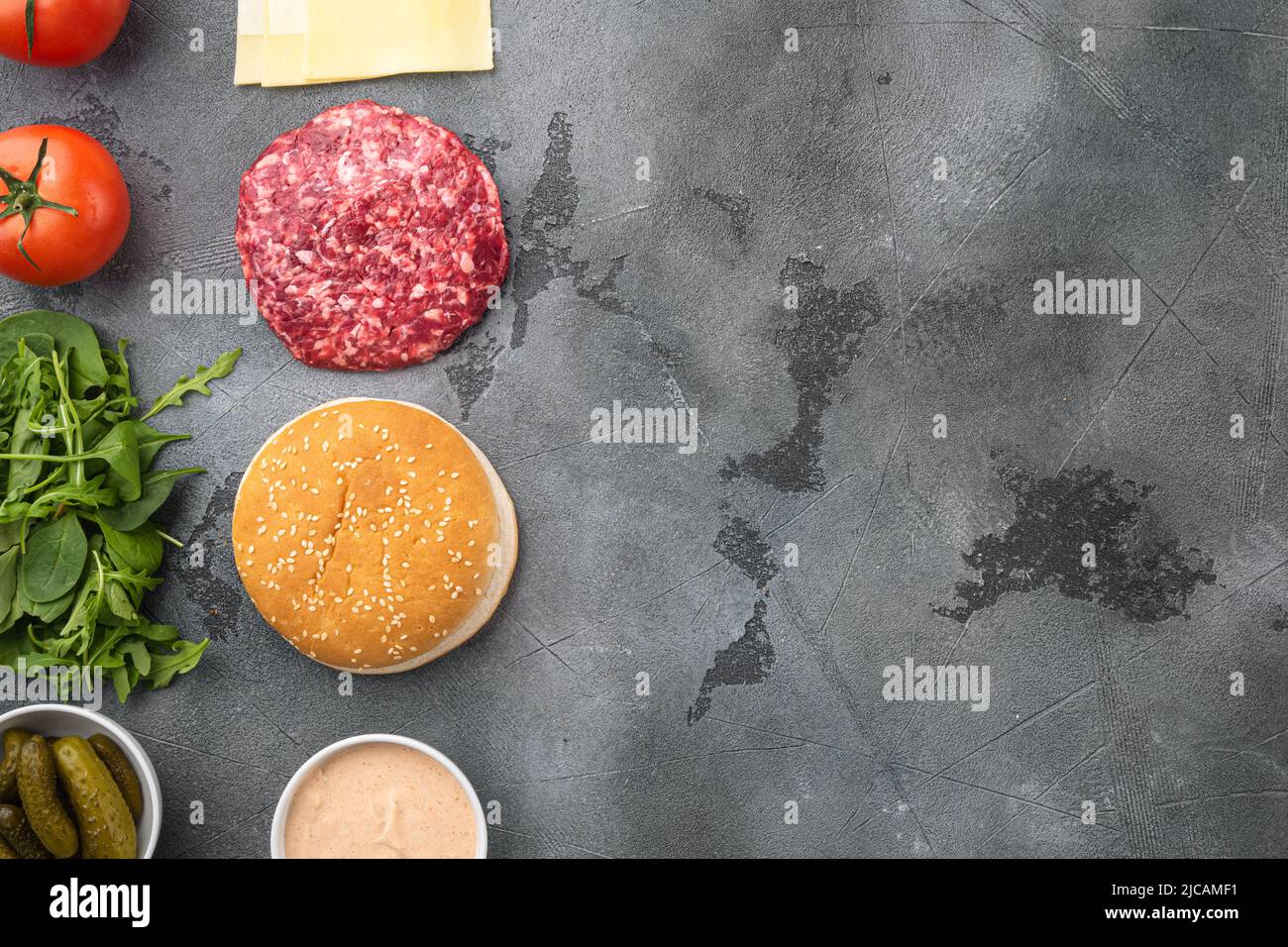 Burger banner. Raw ingredients for burger, on gray stone background ...
