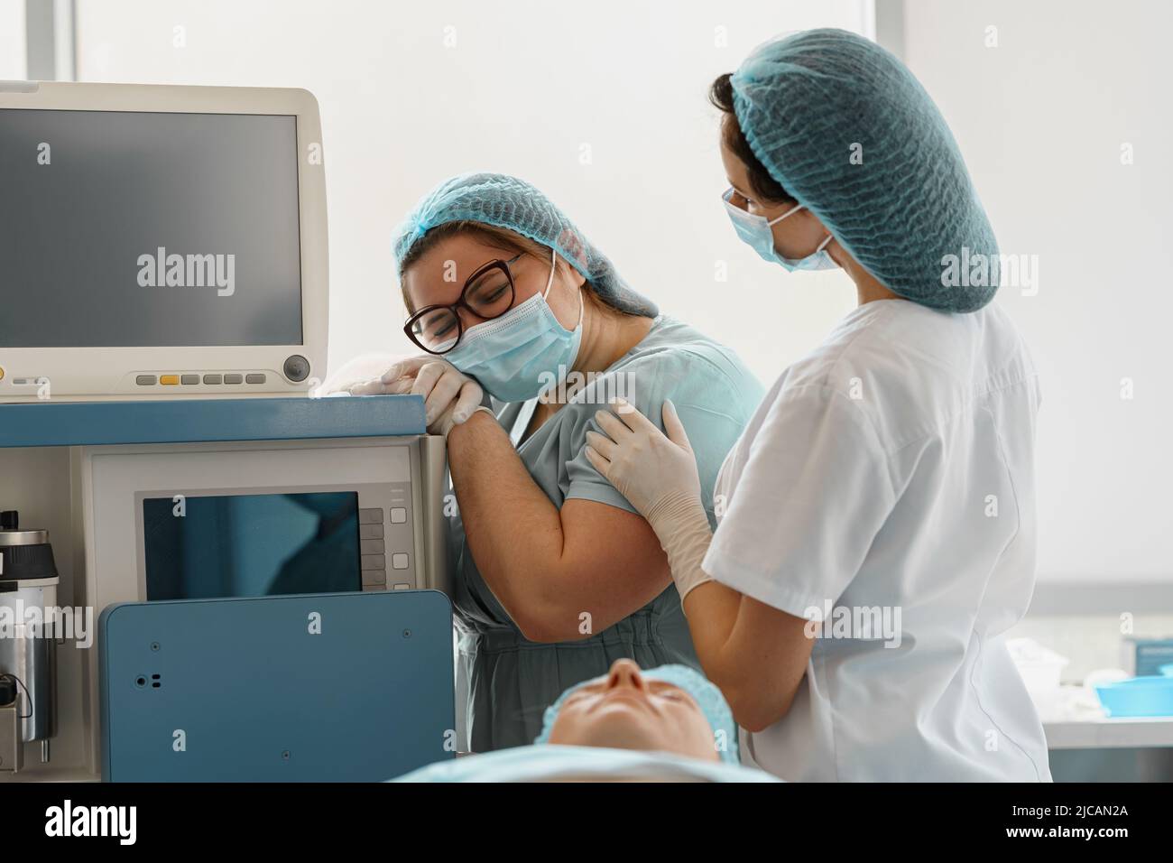 Asian female surgeon in operating room hi-res stock photography and ...