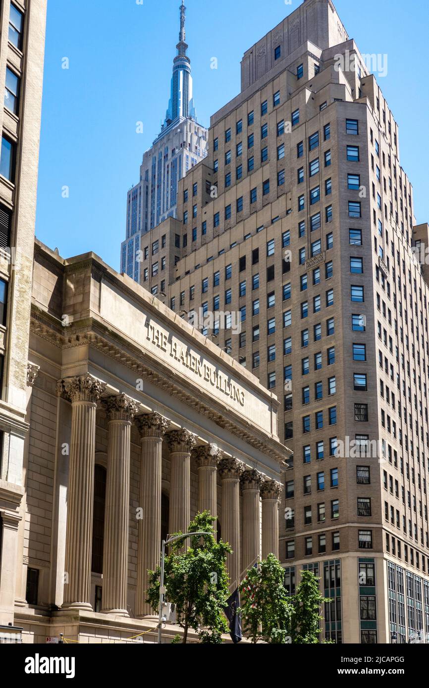 The Empire State Building looms over the Haier Building an historic ...