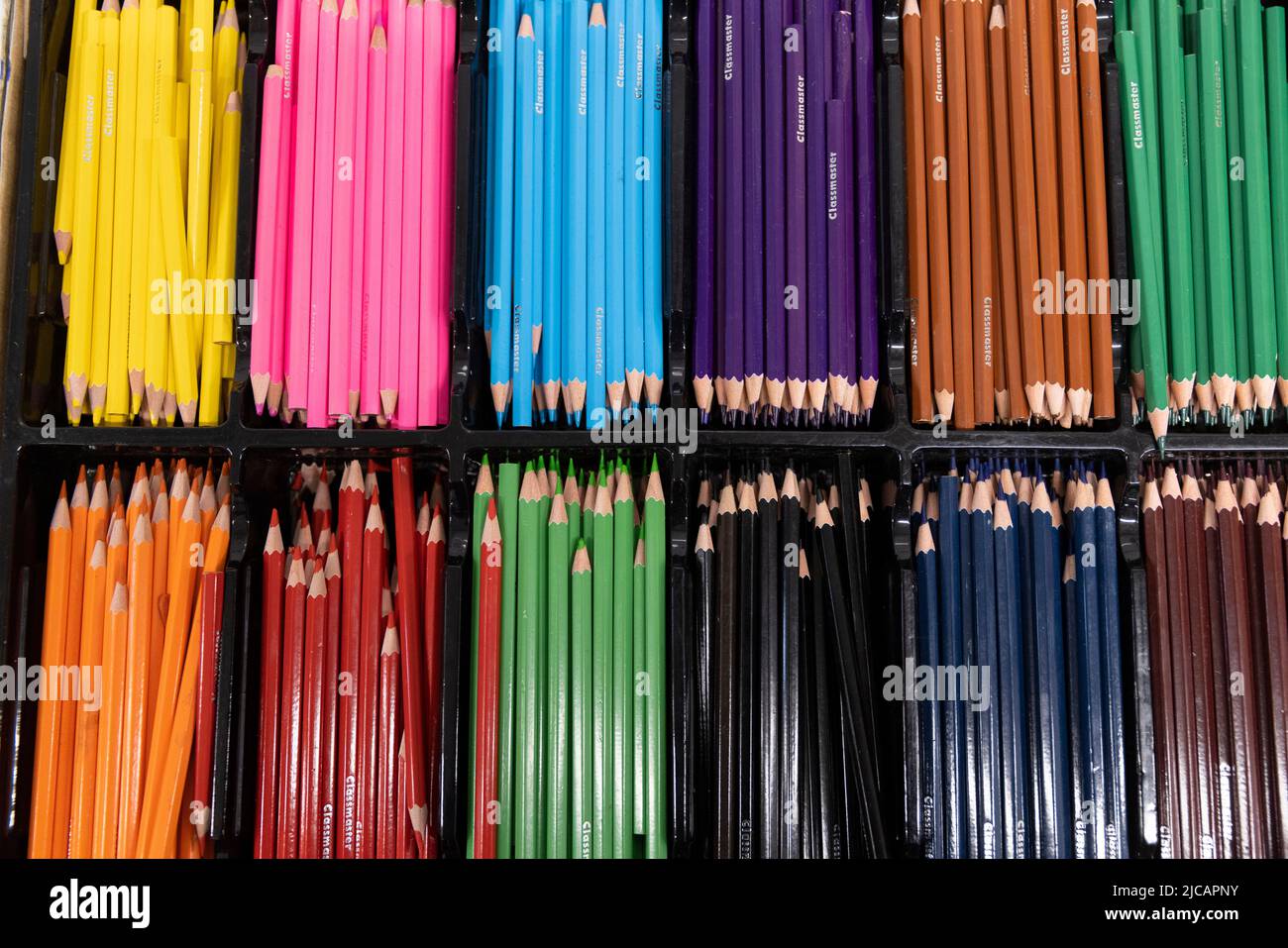 Selection of coloured pencil in primary school art room Stock Photo - Alamy
