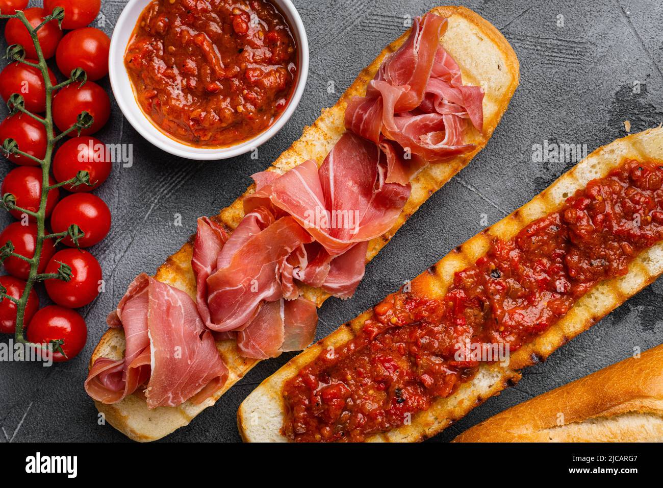 Spanish tomato and jamon toast, traditional breakfast set, on gray ...