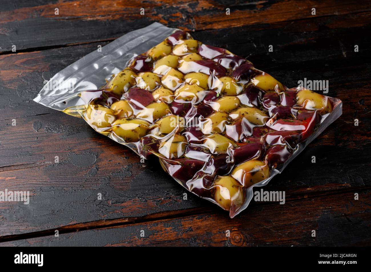 Olives in plastic box hi-res stock photography and images - Alamy