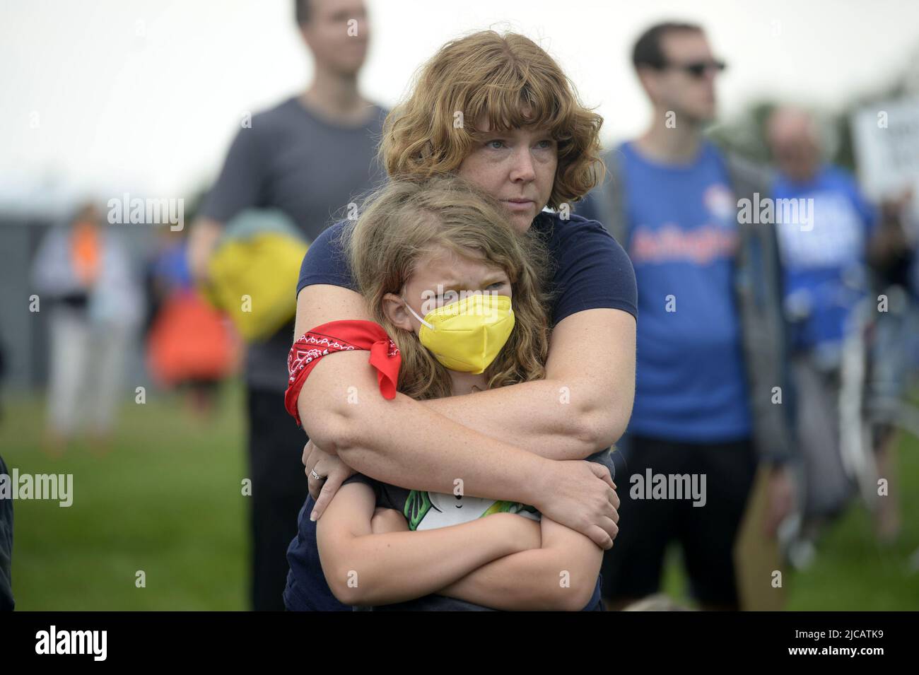 Child hugs mother during hi-res stock photography and images - Alamy