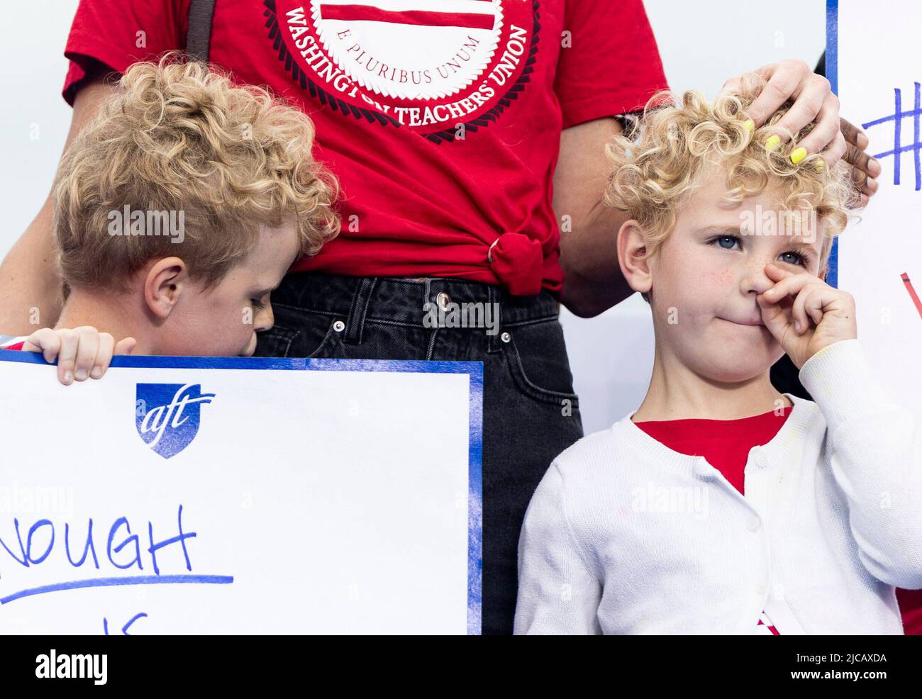 Children surround speakers during the March for Our Lives in Washington ...