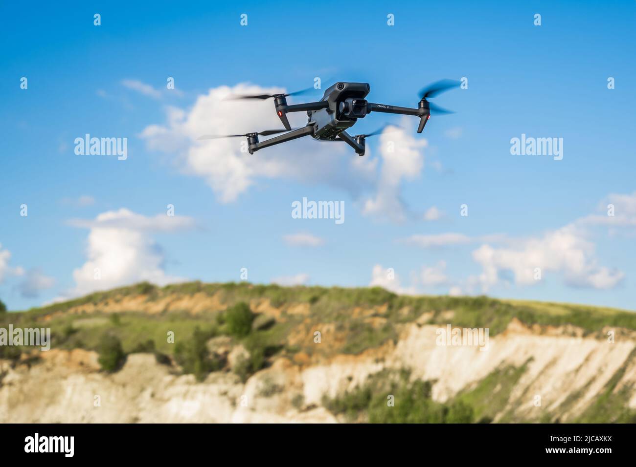 DJI Mavic 3 drone on gray or sky background Stock Photo - Alamy