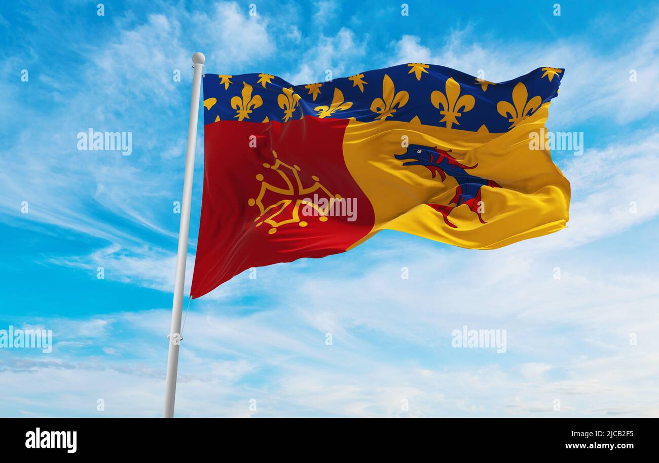 flag of Hautes Alpes, France at cloudy sky background on sunset ...