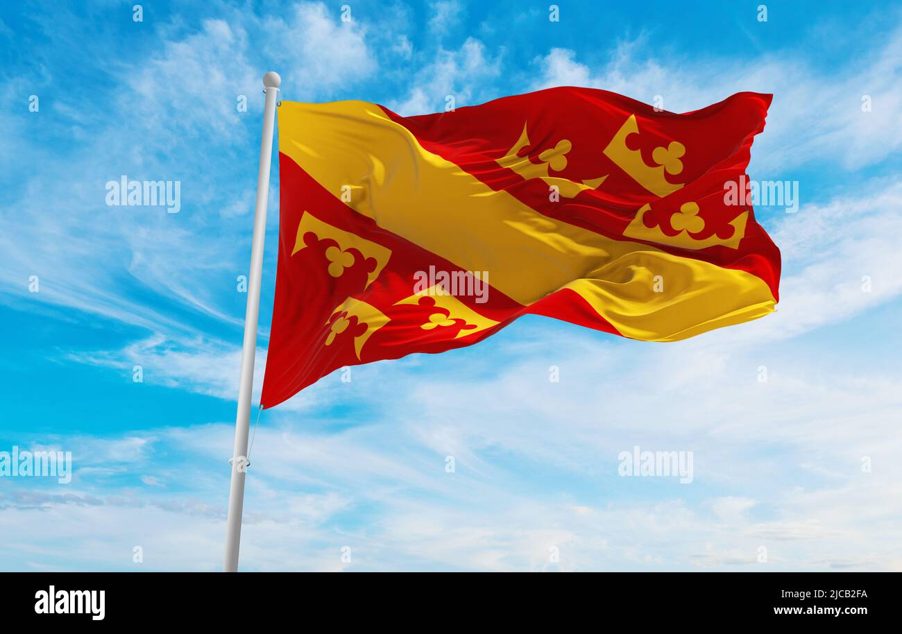 flag of Haute Alsace, France at cloudy sky background on sunset ...
