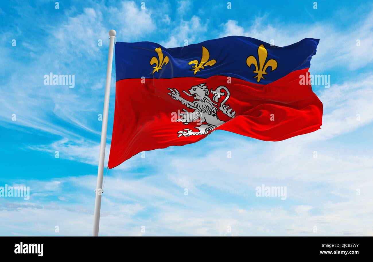 flag of Lyon, France, France at cloudy sky background on sunset ...