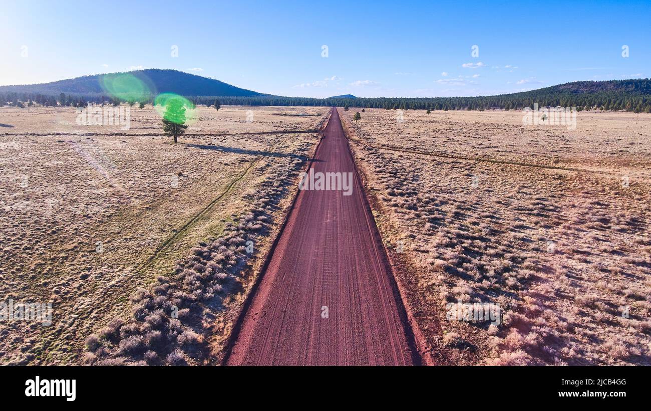 Sandy road with trees and clouds hi-res stock photography and images ...