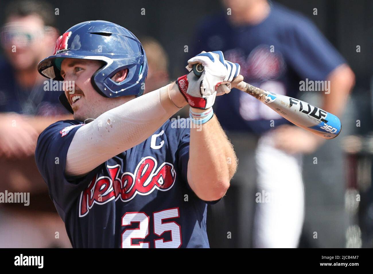 Jun 11, 2022: Ole Miss infielder Tim Elko (25) gets a single early ...