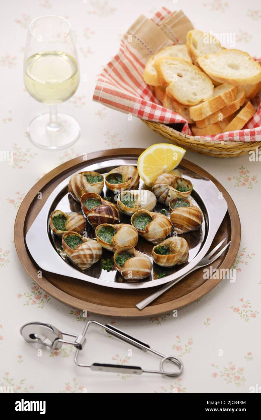 escargots, snails with parsley & garlic butter Stock Photo - Alamy