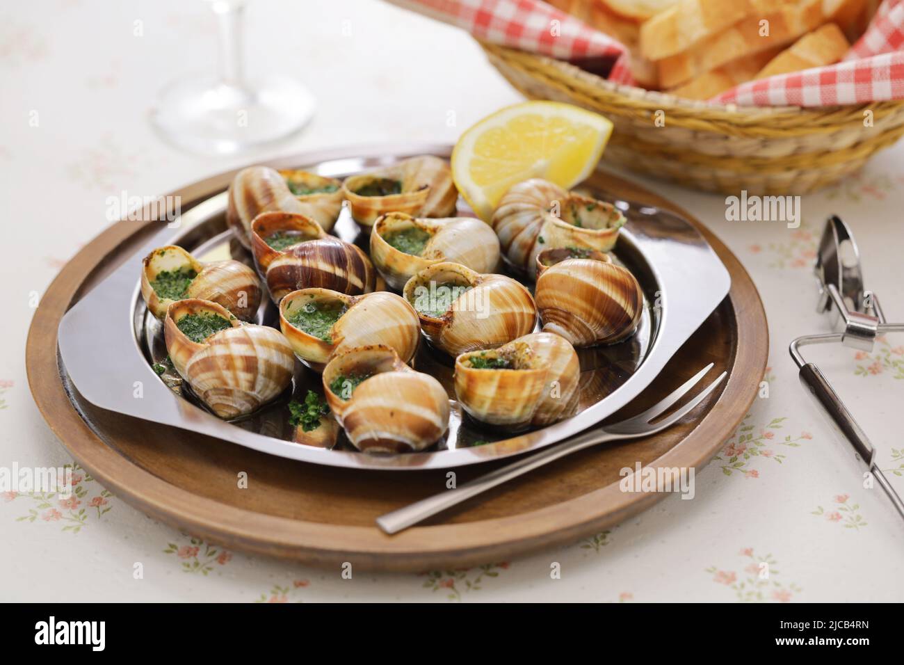 escargots, snails with parsley & garlic butter Stock Photo - Alamy