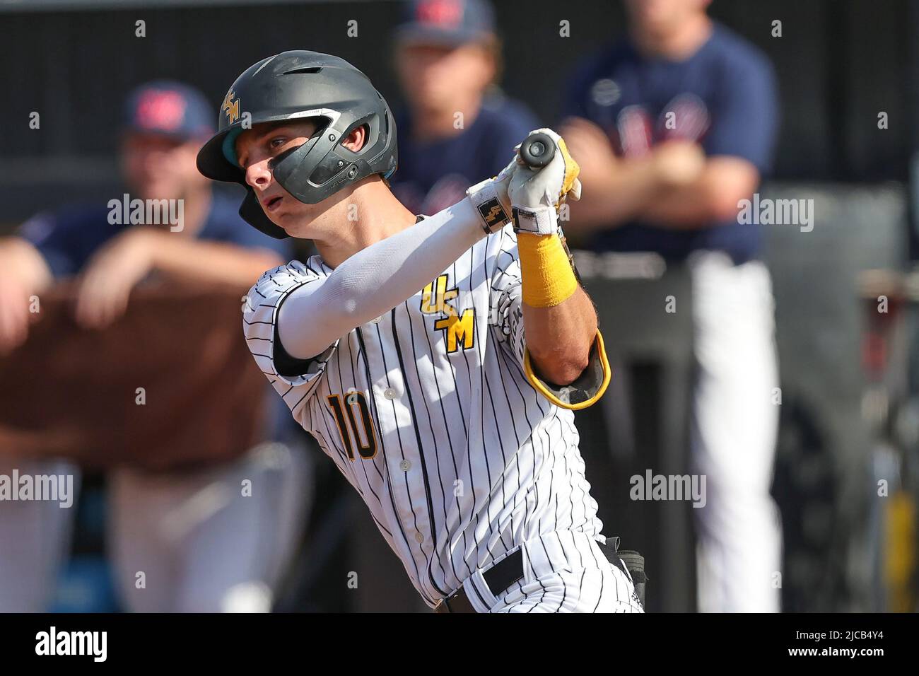 Jun 11, 2022: Southern Miss infielder Dustin Dickerson (10) singles ...