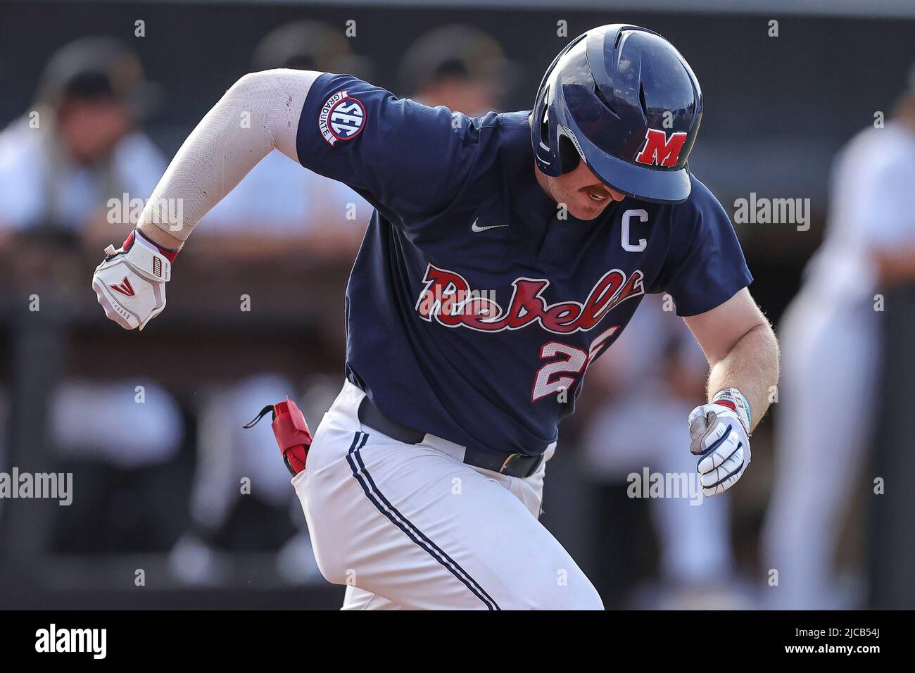 Jun 11, 2022: Ole Miss infielder Tim Elko (25) runs out a hit during a ...