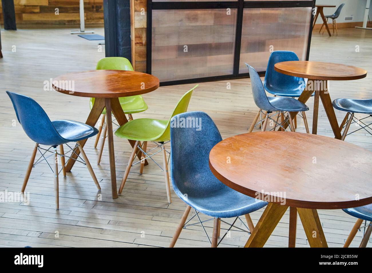 Shared office space table seating area Stock Photo - Alamy