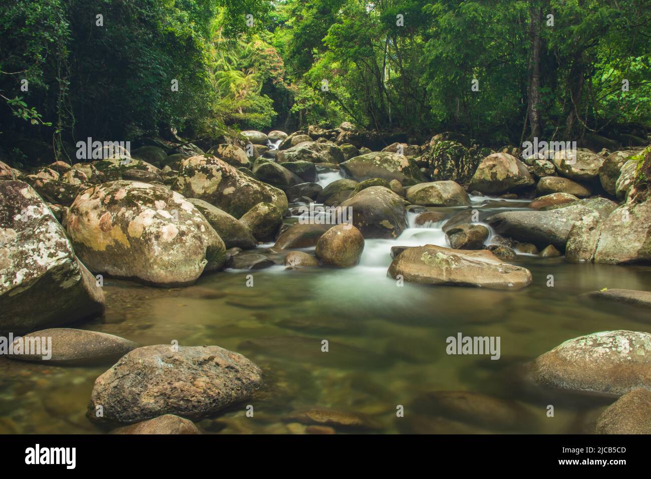 Photo of water flowing between rocks, Mountala river, Aceh, Indonesia ...