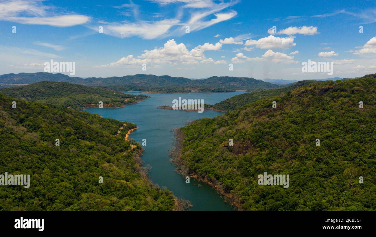 Tropical mountain range and blue lake. Kalu Ganga Reservoir, Sri Lanka ...