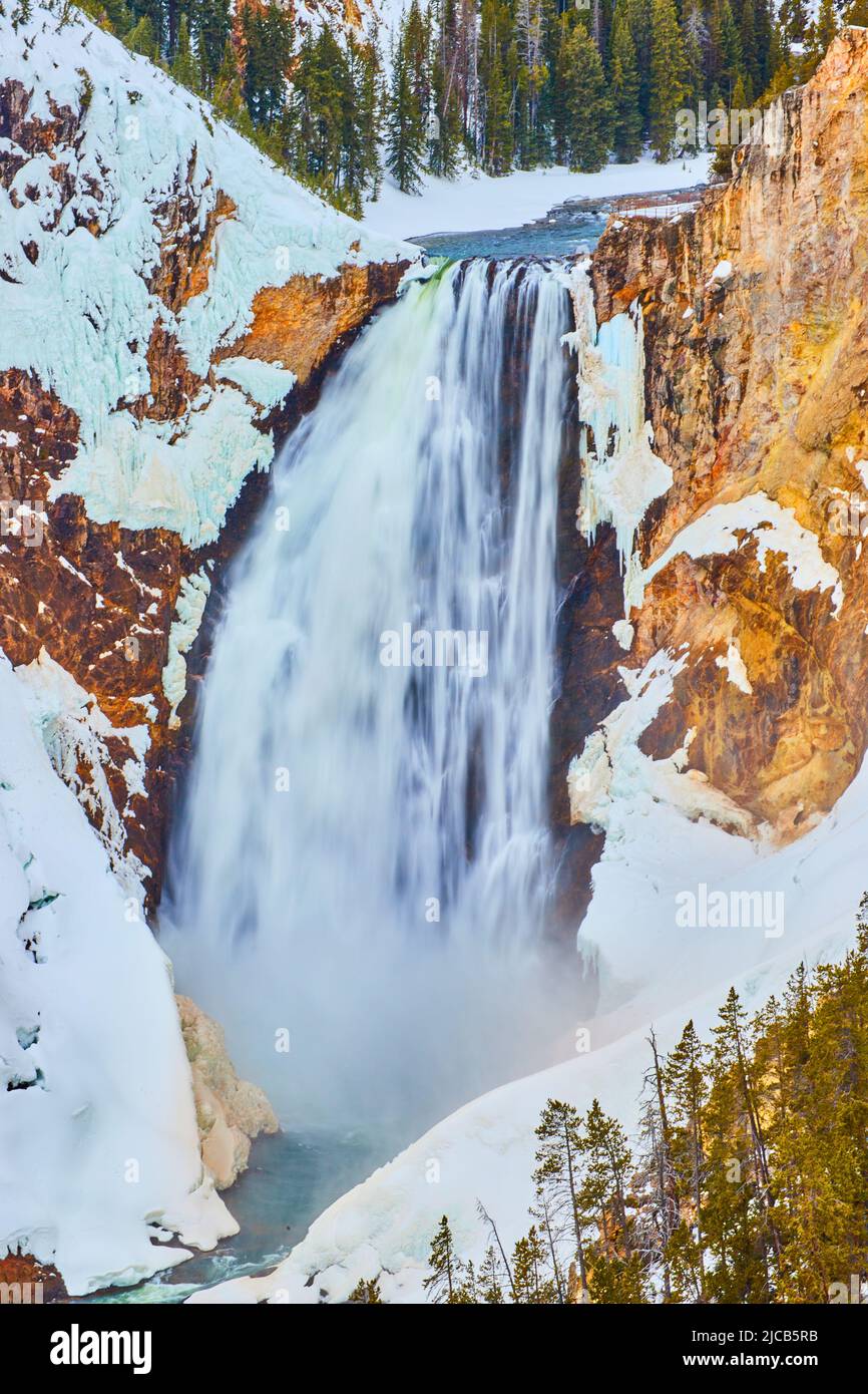 Snowy cliffs with Yellowstone Upper Falls Stock Photo - Alamy