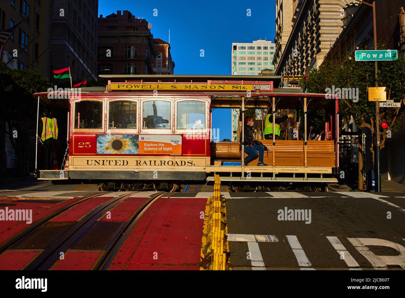 Morning light hitting San Francisco trolley on tracks Stock Photo - Alamy