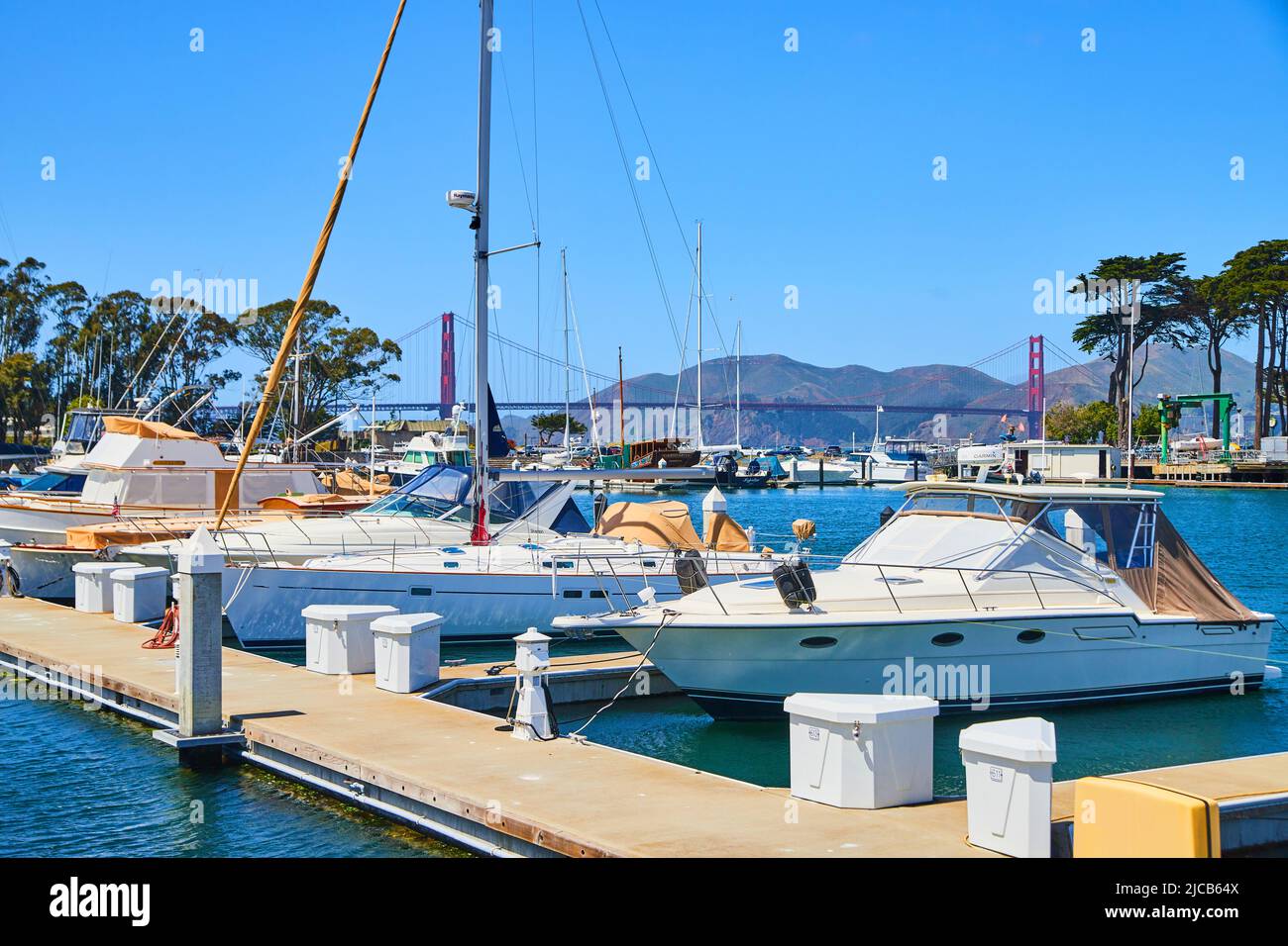 Row of boats on docks outside of Golden Gate Bridge in San Francisco ...