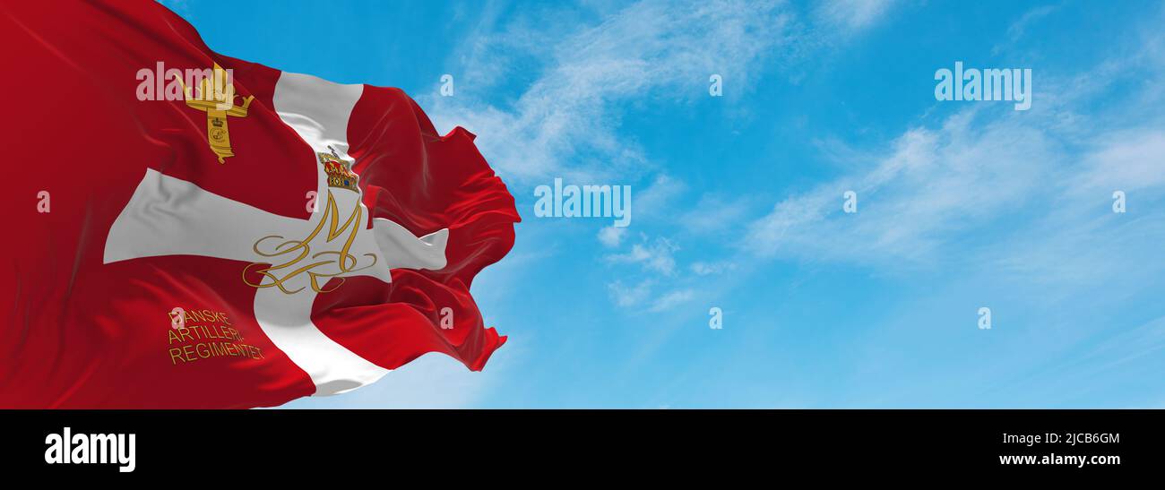 official flag of Danish Artillery Regiment , Denmark at cloudy sky ...