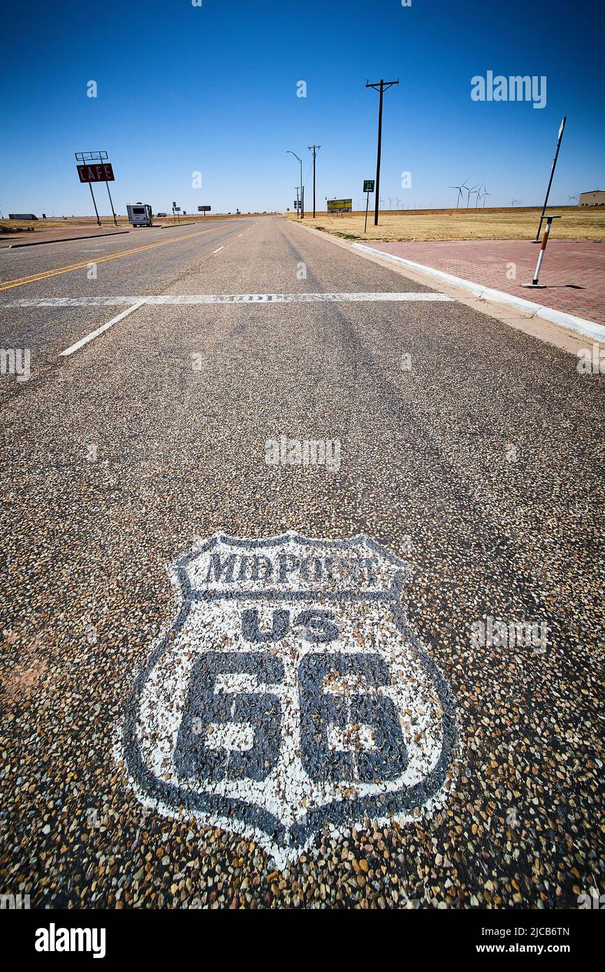 Midpoint symbol on road for iconic Route 66 Stock Photo - Alamy