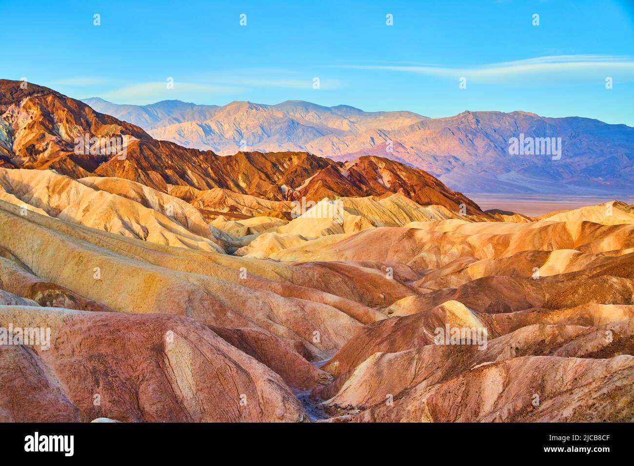 Stunning sunrise colors in desert mountains of Death Valley Stock Photo ...