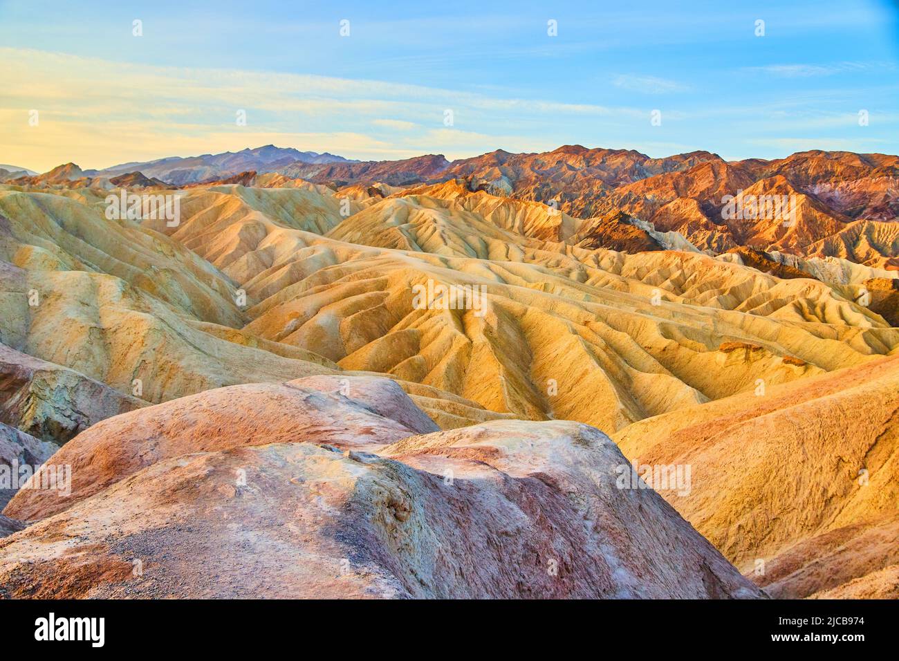 Mountains eroded down to sediment colorful layers in desert Stock Photo ...