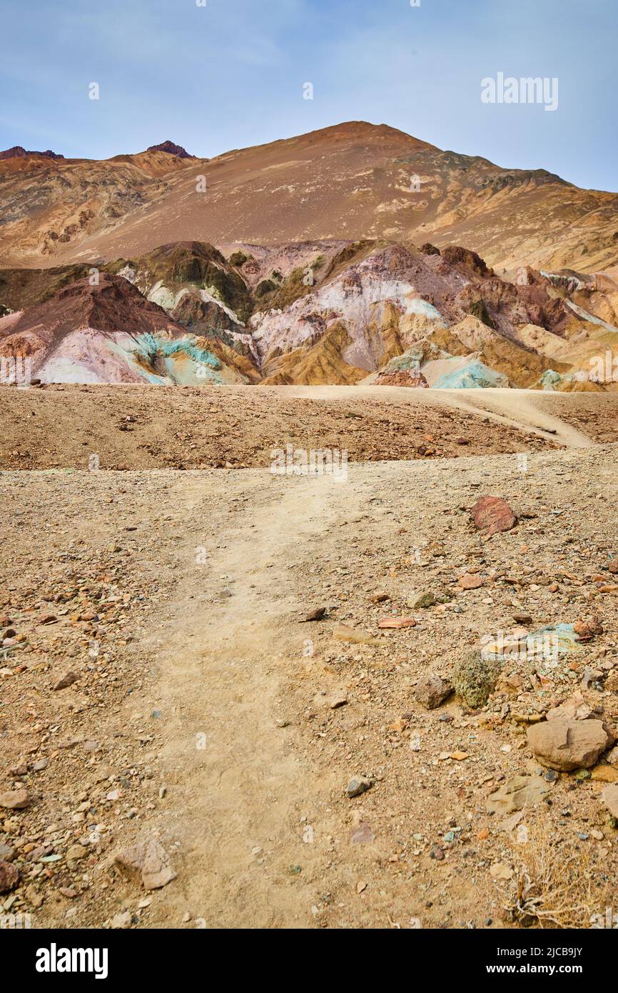 Path leading to colorful mountains in Death Valley Stock Photo - Alamy