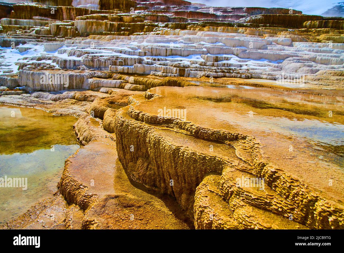 Steamy and snowy hot spring terraces up close in Yellowstone Stock ...