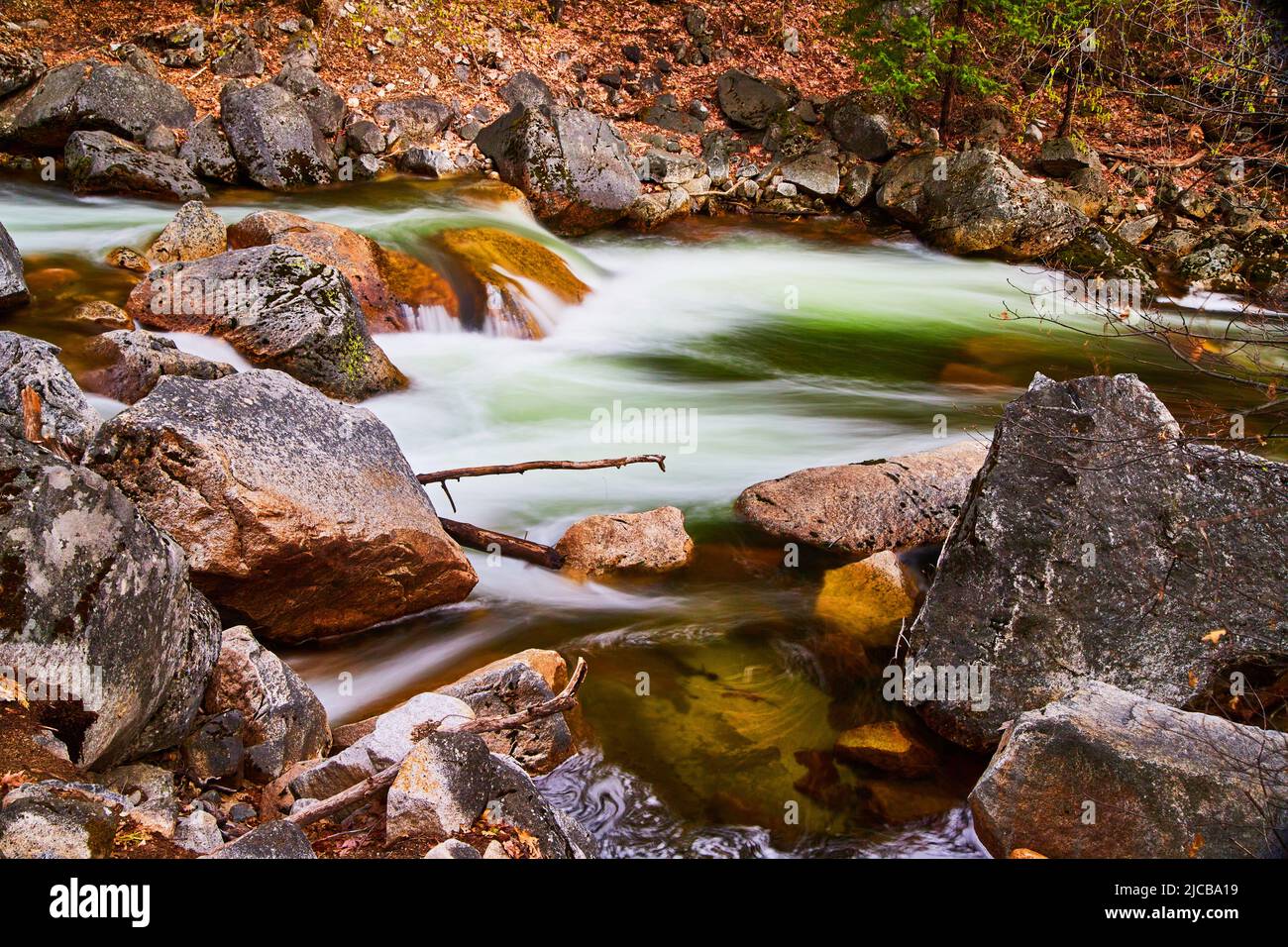 Spring river cascading falls over rocks Stock Photo - Alamy