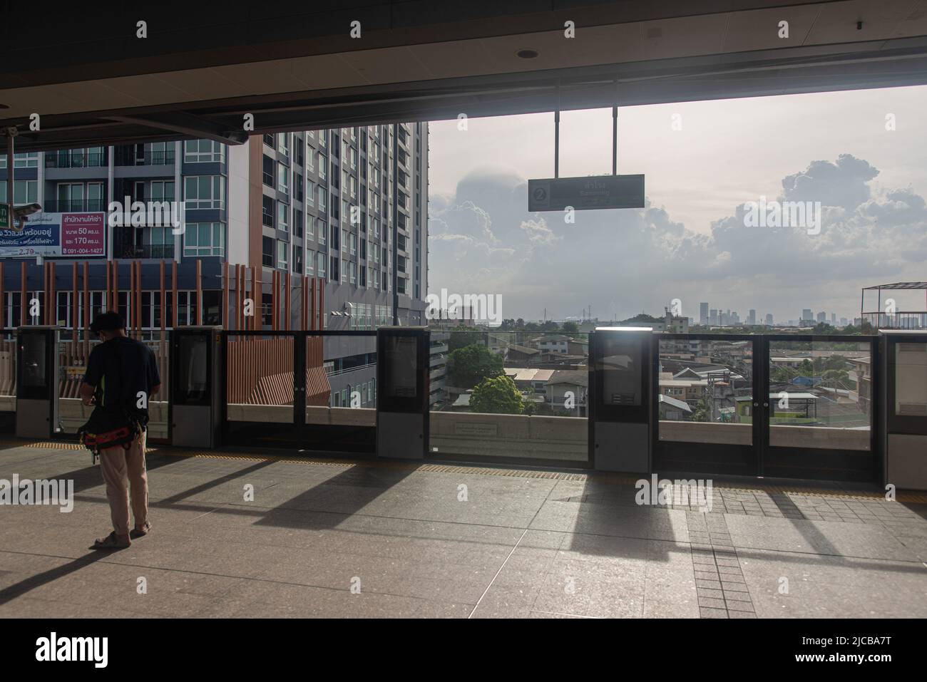 A man seen waiting for Skytrain at BTS Samrong in Samut Prakarn. (Photo by Peerapon Boonyakiat ...