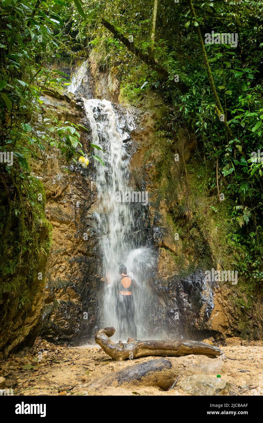 Woman bathing in waterfall hi-res stock photography and images - Alamy