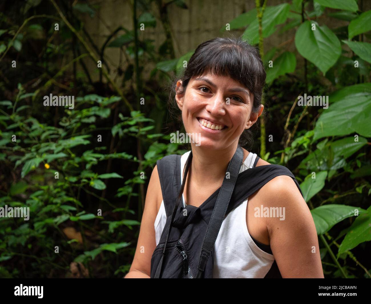 Latin Woman Looking and Smiling at the Camera in the Middle of Nature ...