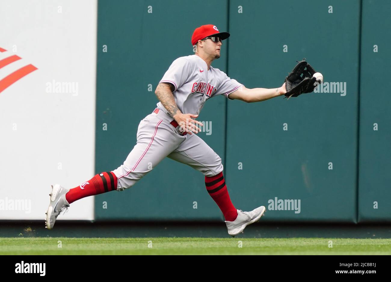 Cincinnati Reds Nick Senzel makes a catch on a ball off the bat of St ...