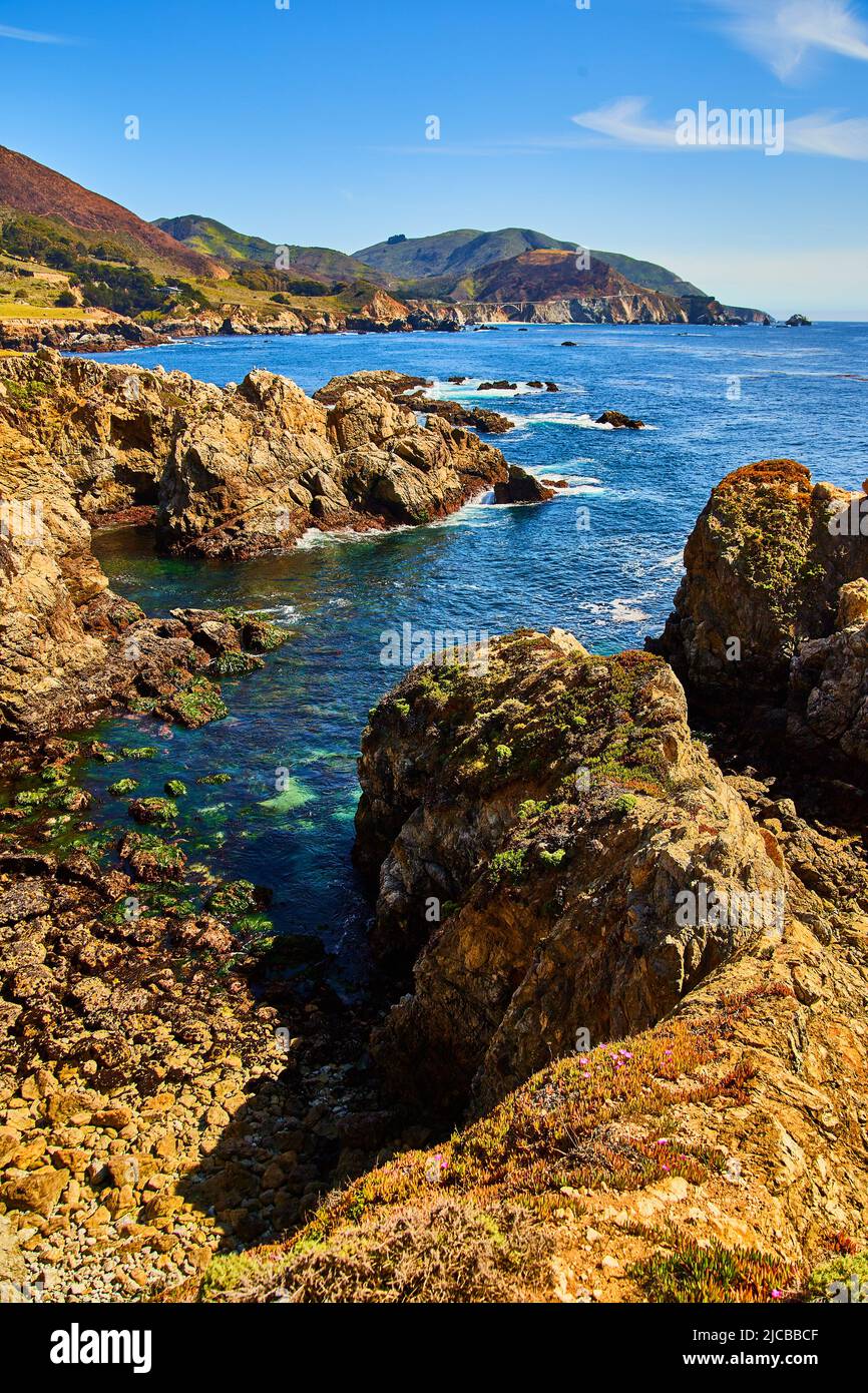 Tide pools from above surrounded by rock formations Stock Photo - Alamy