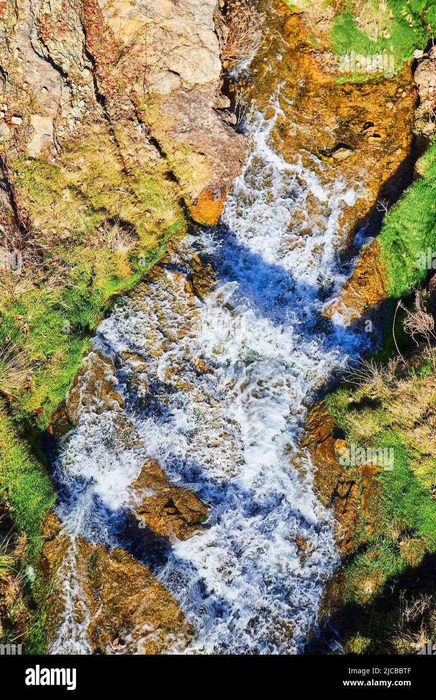 Looking down on river of cascading waters Stock Photo - Alamy