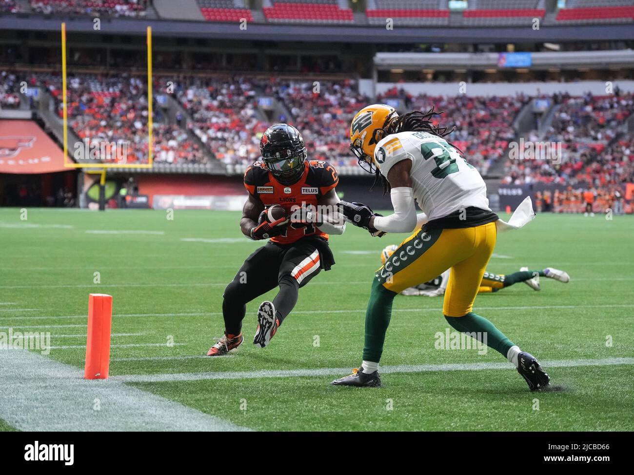 June 11, 2022, VANCOUVER, BC, CANADA: B.C. Lions' James Butler, left ...