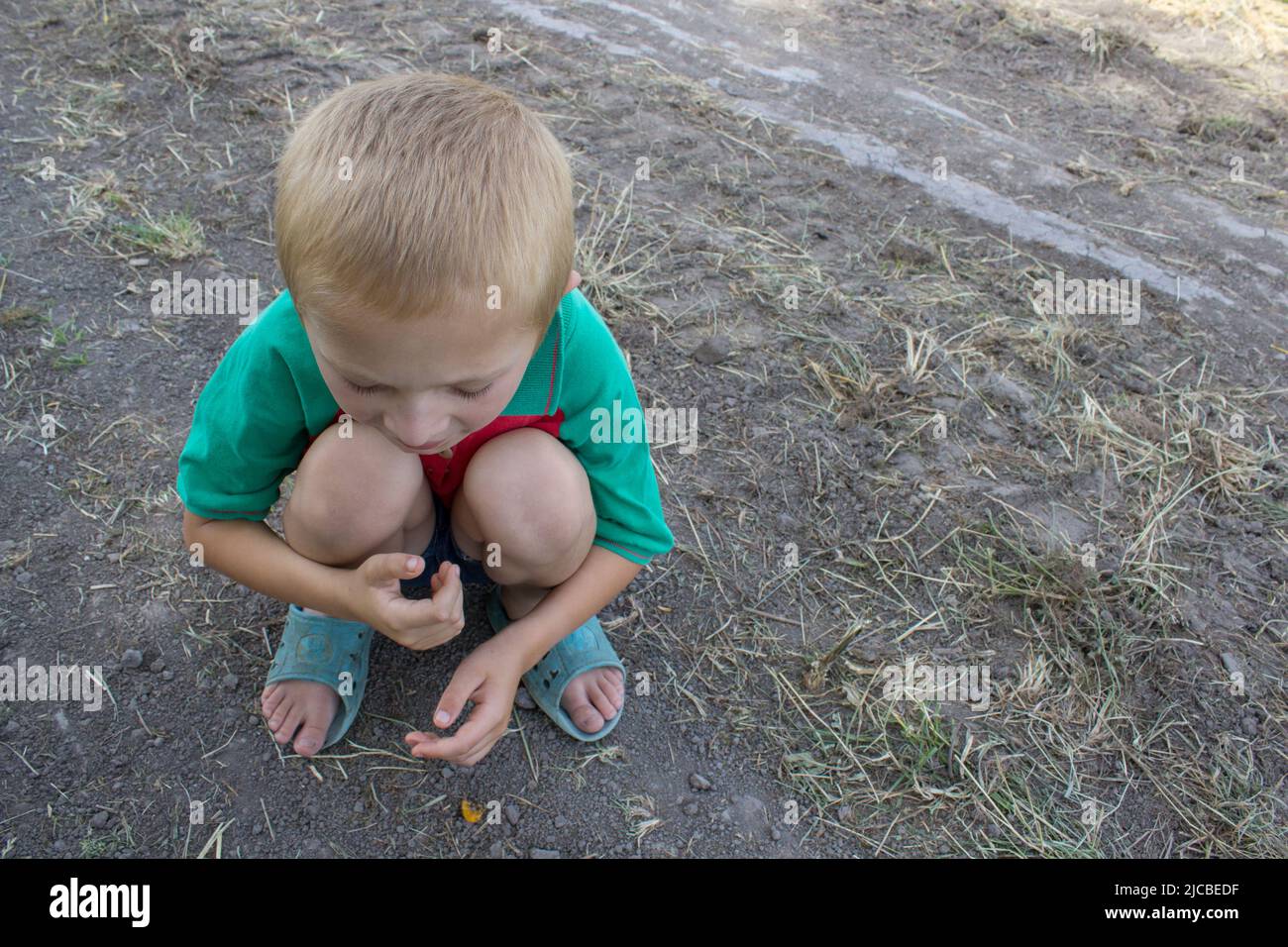 Squatted man hi-res stock photography and images - Alamy